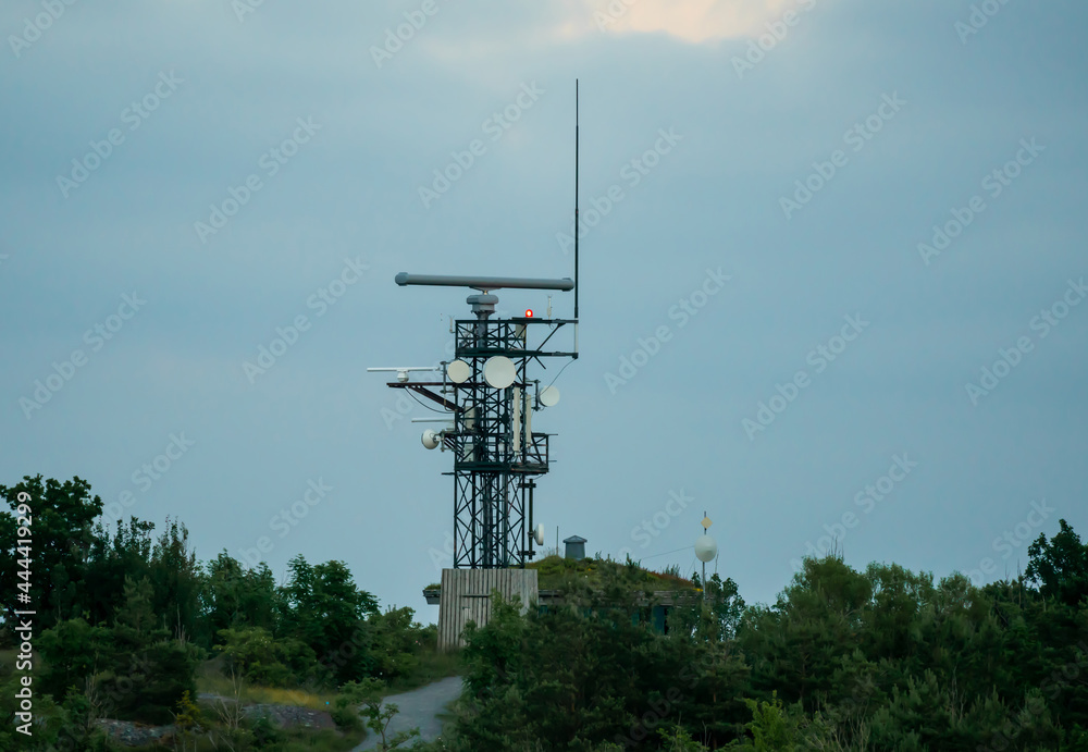 Large military of coast guard radar antenna and communications tower ...