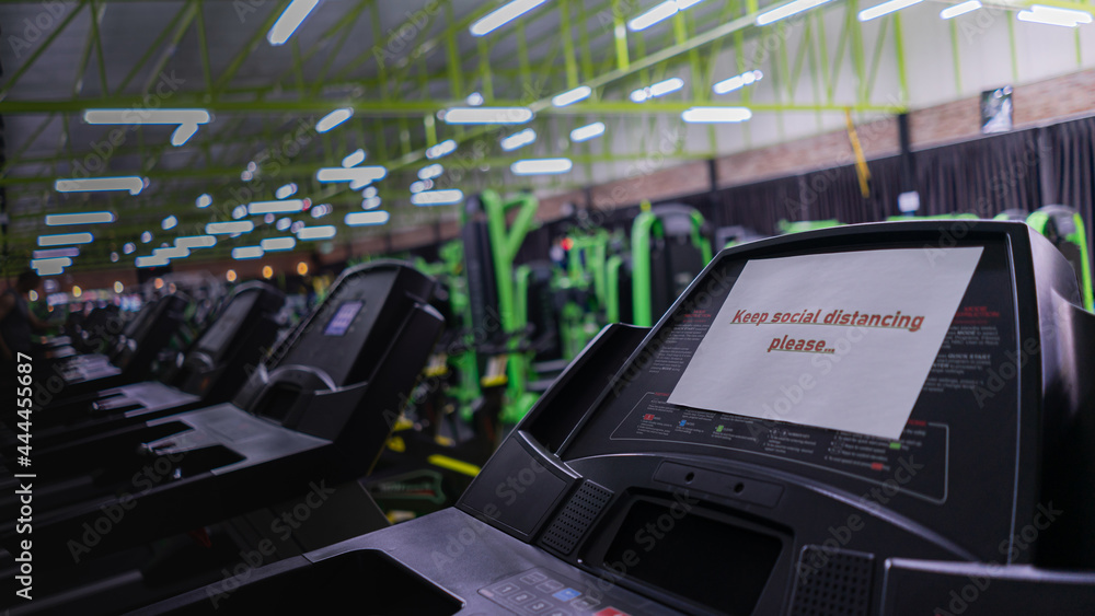 New normal Gym and Fitness. The treadmill is labeled message "Keep ...