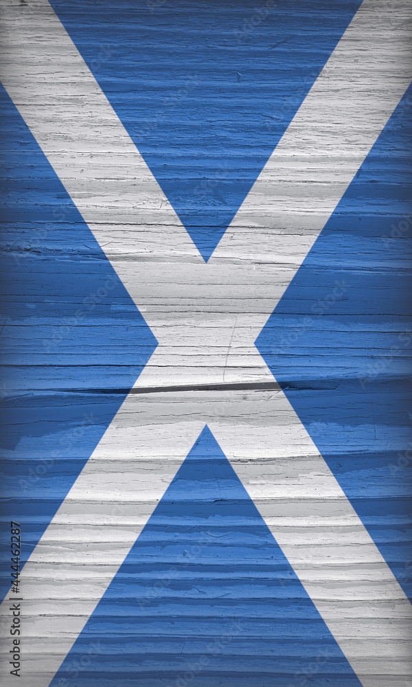 Flag of Scotland on a dry wooden surface. Vertical vintage backdrop ...