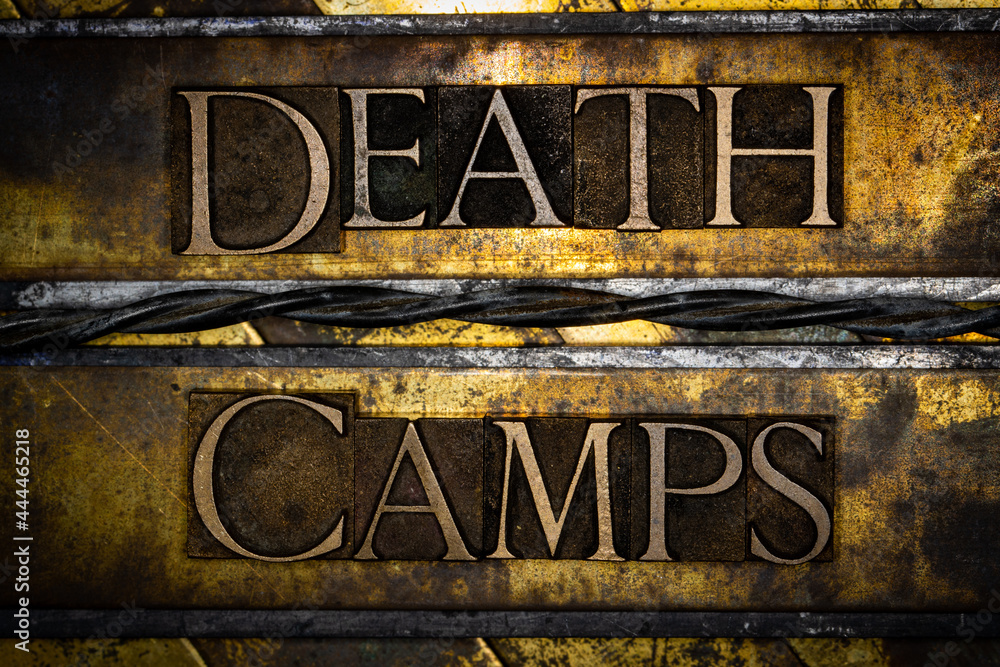 Death Camps text with barbed wire on vintage textured grunge copper and ...