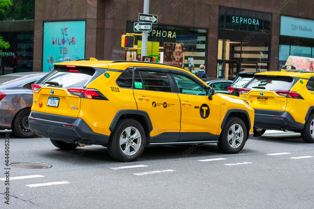 New York City yellow taxi cab Toyota RAV4 hybrid vehicles on city ...