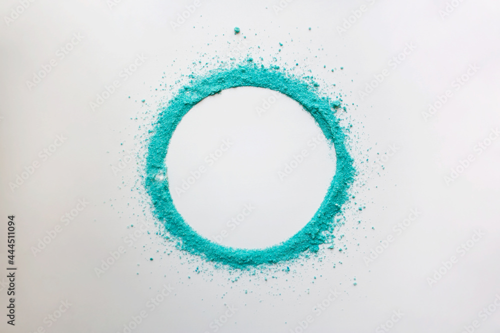 Turquoise colored powder circle frame on white background Stock Photo ...