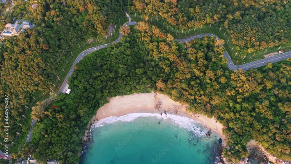 Wideo Stock: 4K Areal drone top down view of curves of coastal road ...