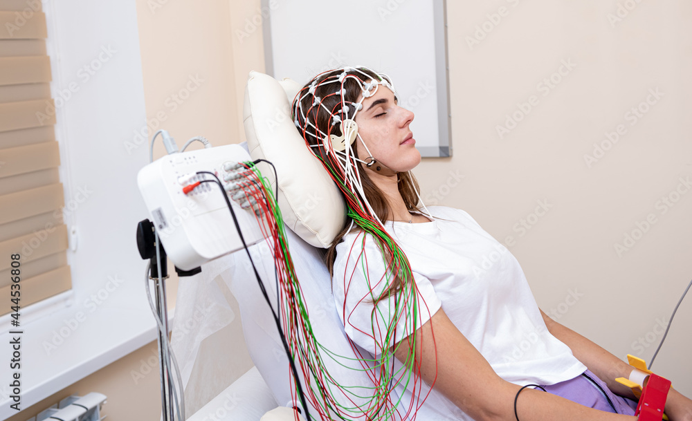 Patient brain testing using encephalography at medical center Stock ...