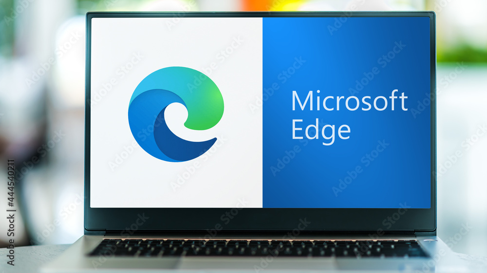 Laptop computer displaying logo of Microsoft Edge Stock Photo | Adobe Stock