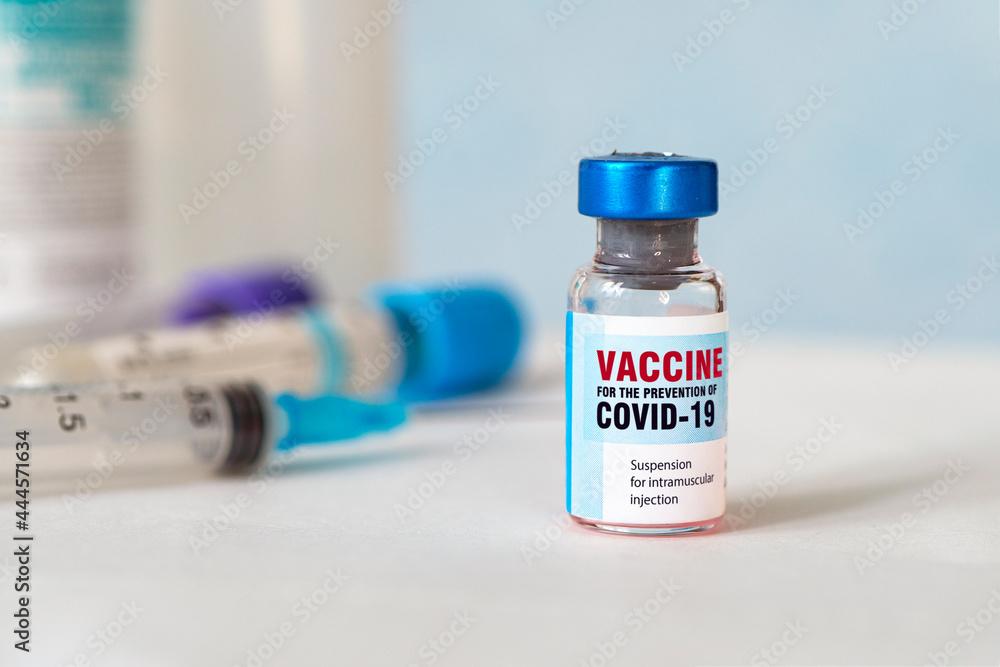 Small vaccine bottle phial with label that reads Covid - 19 Corona ...