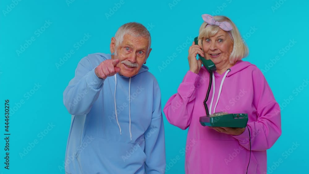 Hey you, call me back. Senior stylish grandparents pensioners talking ...