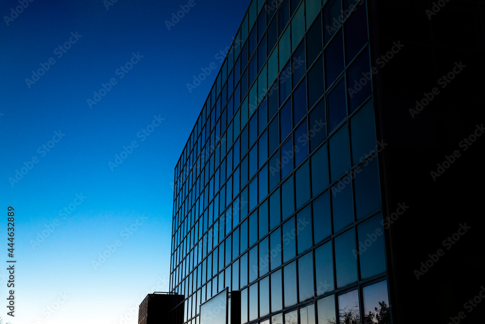 High rise building against the vignette clear blue sky Stock Photo ...