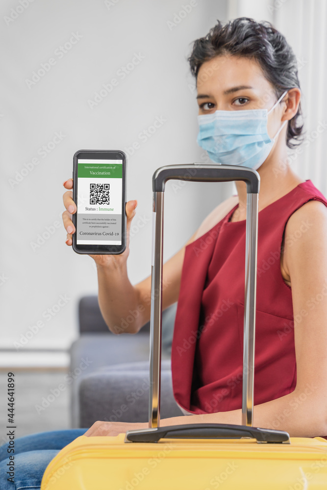 covid-19 vaccination certificate with QR code on smartphone application ...