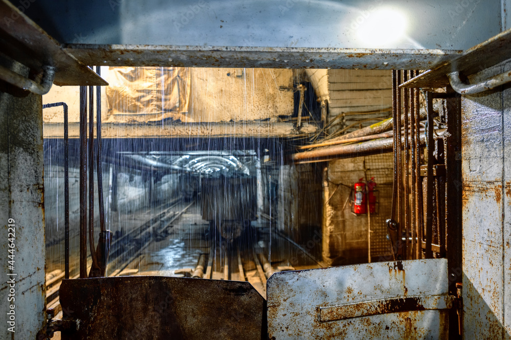 The view from the mine elevator, the mine tunnel is visible, a stream ...