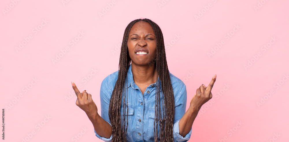 afro black adult woman feeling provocative, aggressive and obscene ...