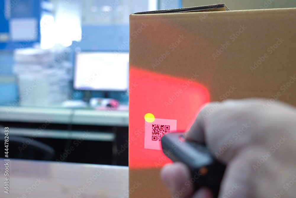 Mini wireless barcode reader, reads information from a QR code on the ...