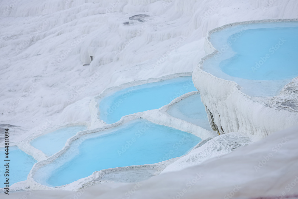 Natural travertine pools and terraces in Pamukkale. Cotton castle in ...