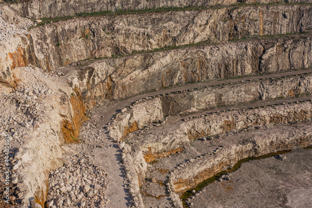 Dolomite quarry.Photo from the top. Industrial terraces in a mining ...