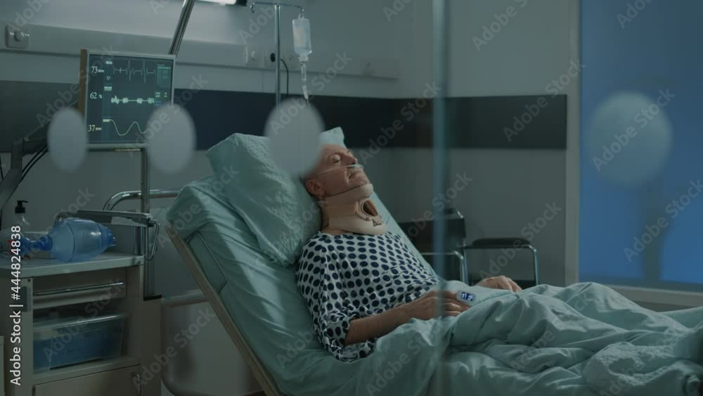 Sick patient recovering from injury with cervical collar for neck in ...