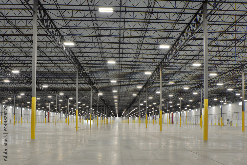 Interior of large white industrial warehouse building Stock Photo ...