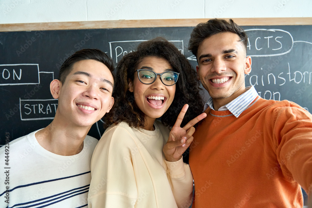 Happy College Students In Classroom