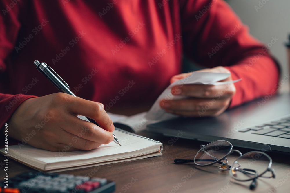 Women calculate domestic bills at home. Young women checking balance ...