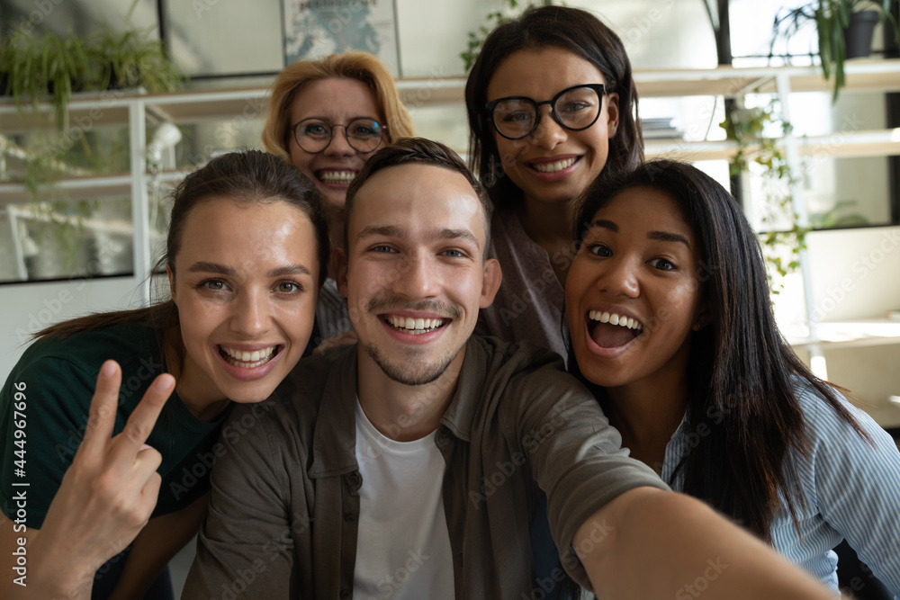 Happy excited diverse business team, mixed race employees of different ...