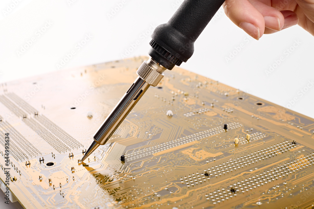 Soldering iron isolated on a white background. A tool for soldering ...