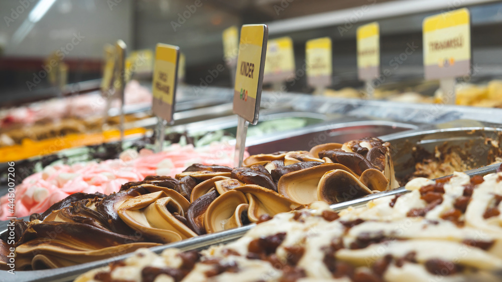Ice cream display case with various flavors ready to serve Stock Photo ...
