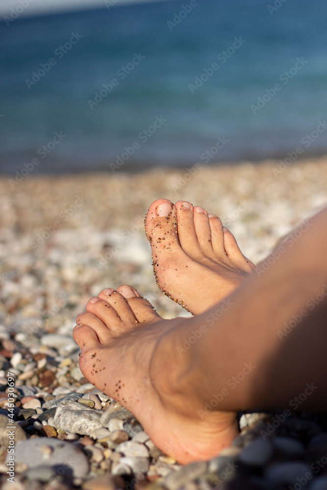 feet in sand, summer beach and beautiful sunburn legs by the sea Stock ...