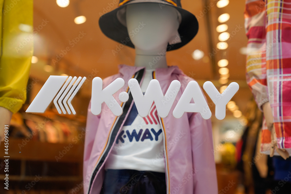 K-Way text brand and logo sign front of Raincoat store and rainproof ...