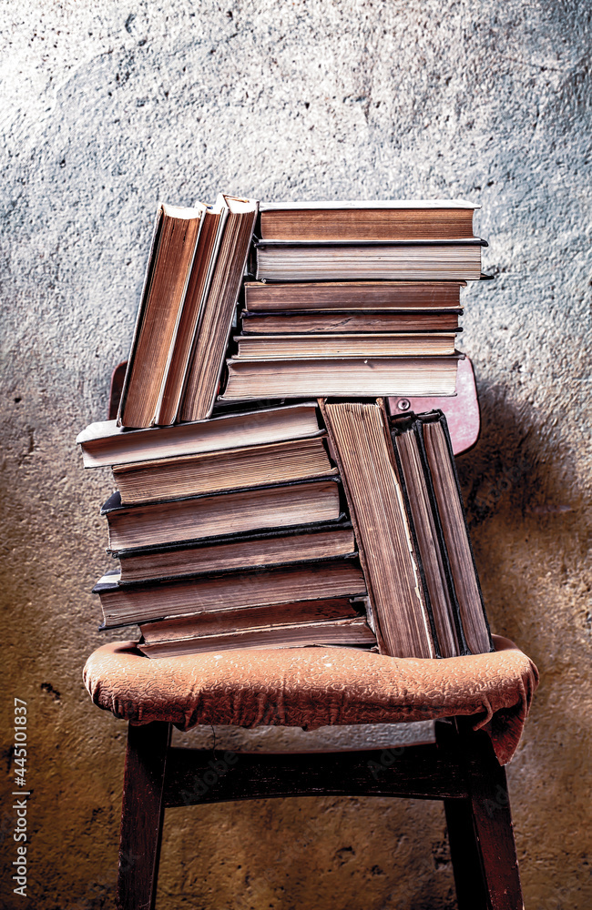 Vintage Background with Old Books. Stack of Books Folded on a Chair ...