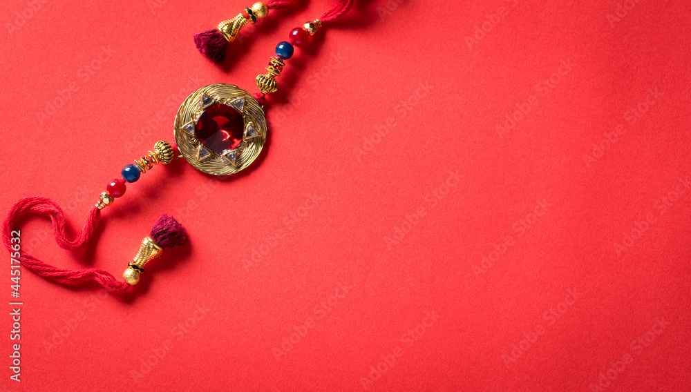 Raksha Bandhan, Indian festival with beautiful Rakhi and Rice Grains on ...