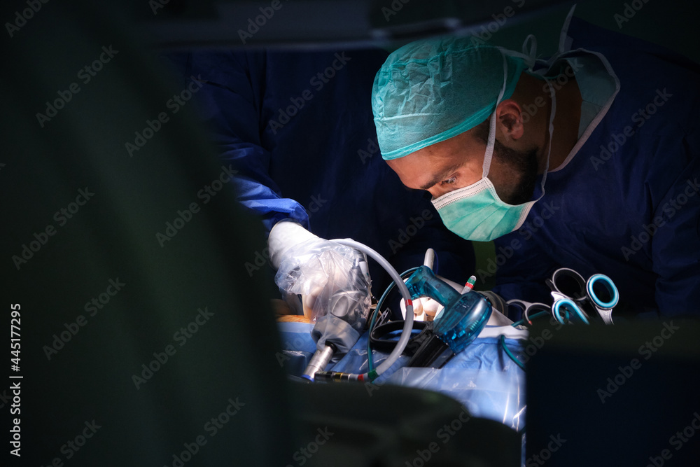 surgeon during a laparoscopic operation Stock Photo | Adobe Stock