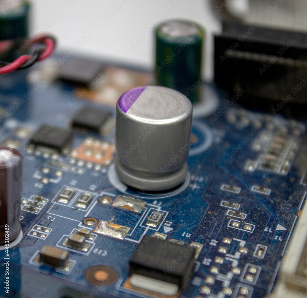 A microchip with components in close-up. Processor with resistors ...