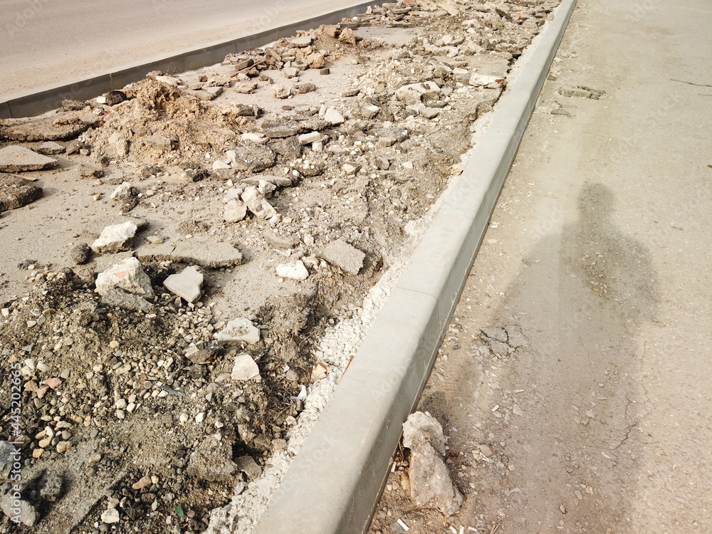 Footpath reconstruction. New curbstone installed and ready to be fixed ...