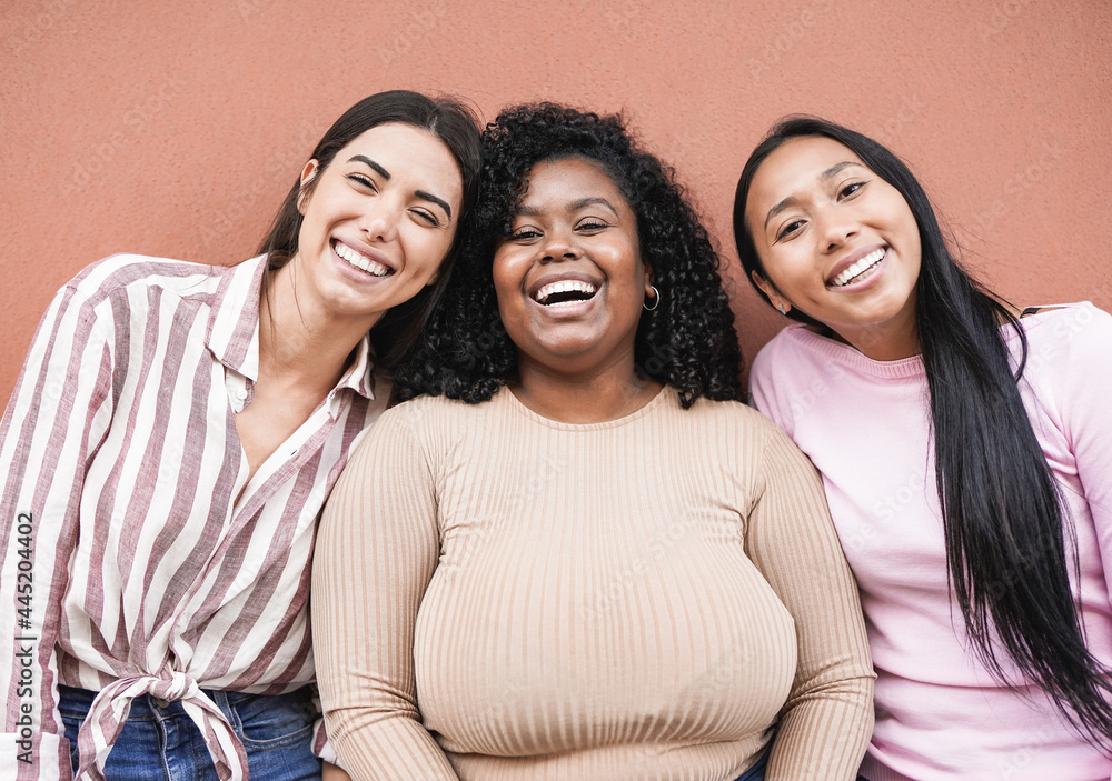 Happy latin women with different skin color looking in camera - Concept ...