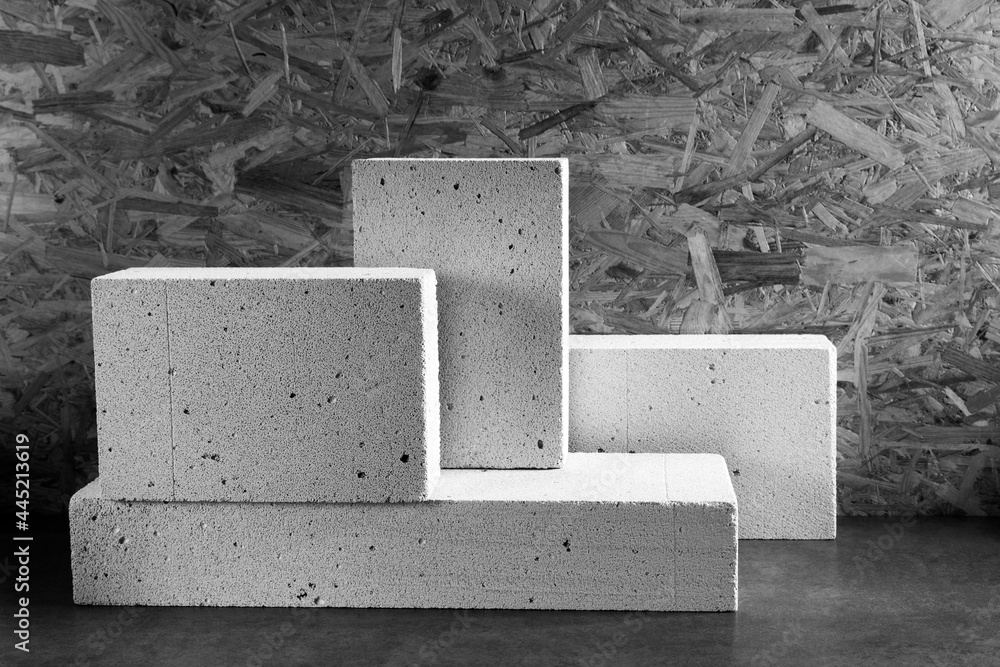 Aerated concrete block cube or bricks near osb wall background texture ...