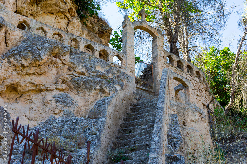 Civic medieval village. Medieval monastery built into the rock of the ...