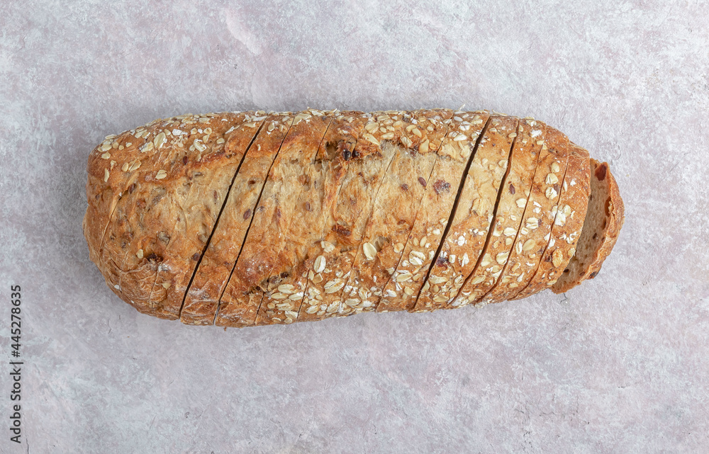 Rye bread loaf with seeds, raisins and muesli. Healthy food concept ...