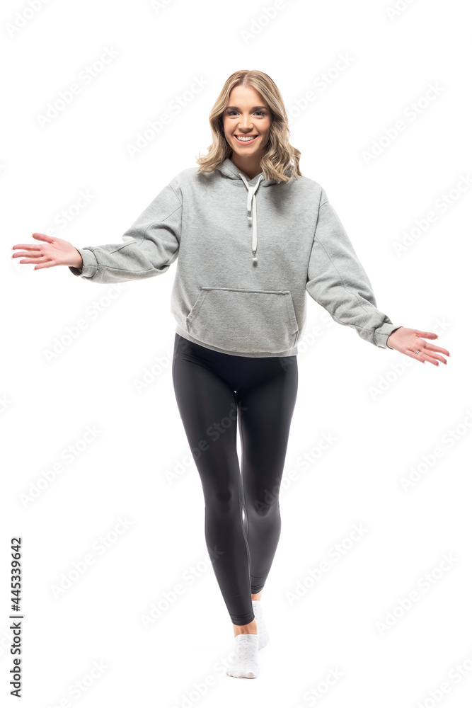 Excited woman walking with open arms for hug meeting with warm welcome ...
