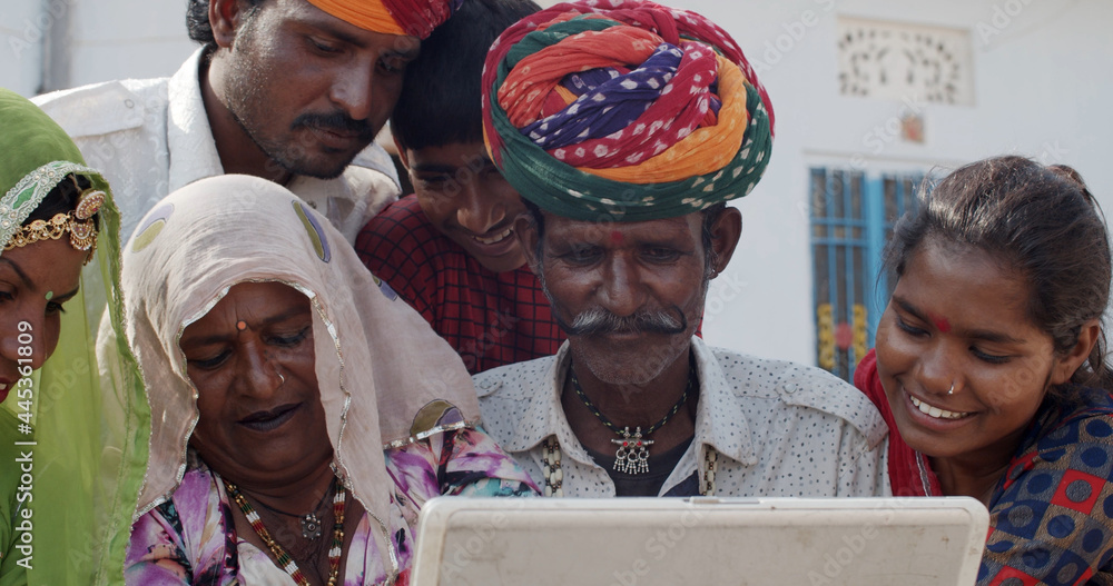 Indian family having a video call with a relative Stock Photo | Adobe Stock