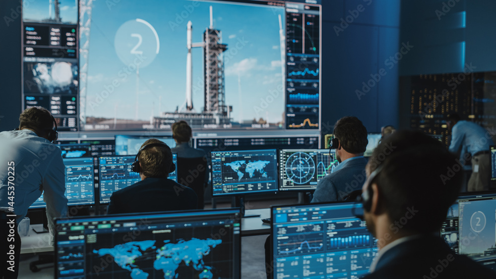 Group of People in Mission Control Center Counts Down the Seconds ...