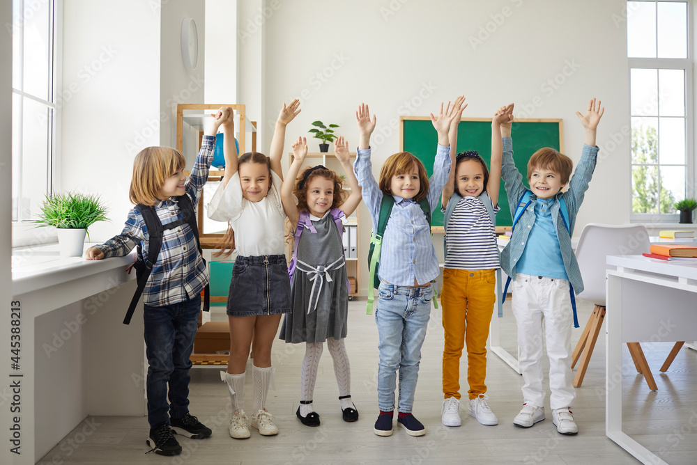 Group portrait of happy elementary school students. Bunch of cute ...