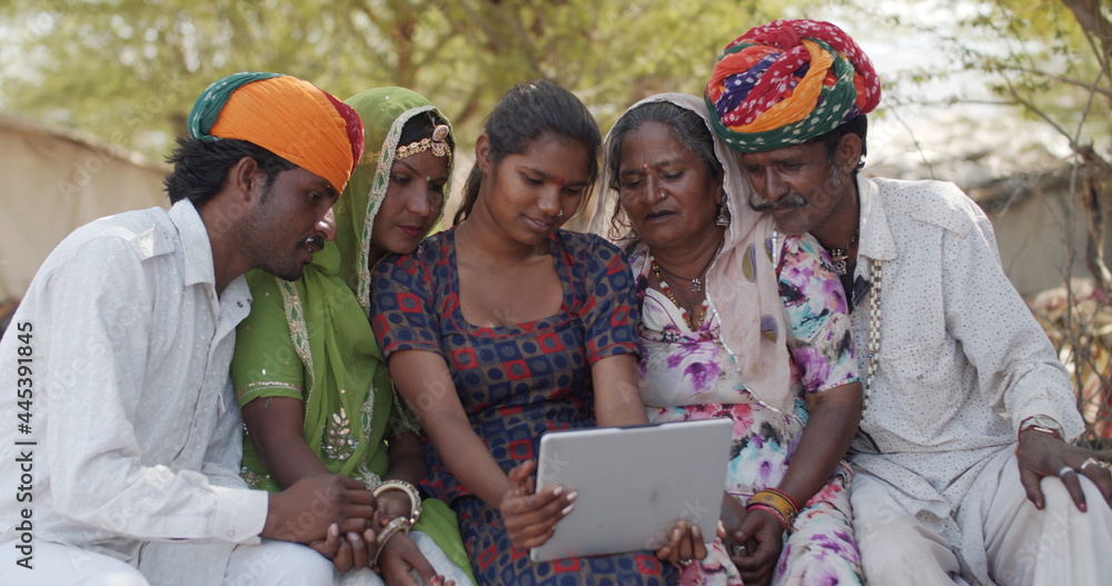 Group of indian people having a conversation via a tablet Stock Photo ...