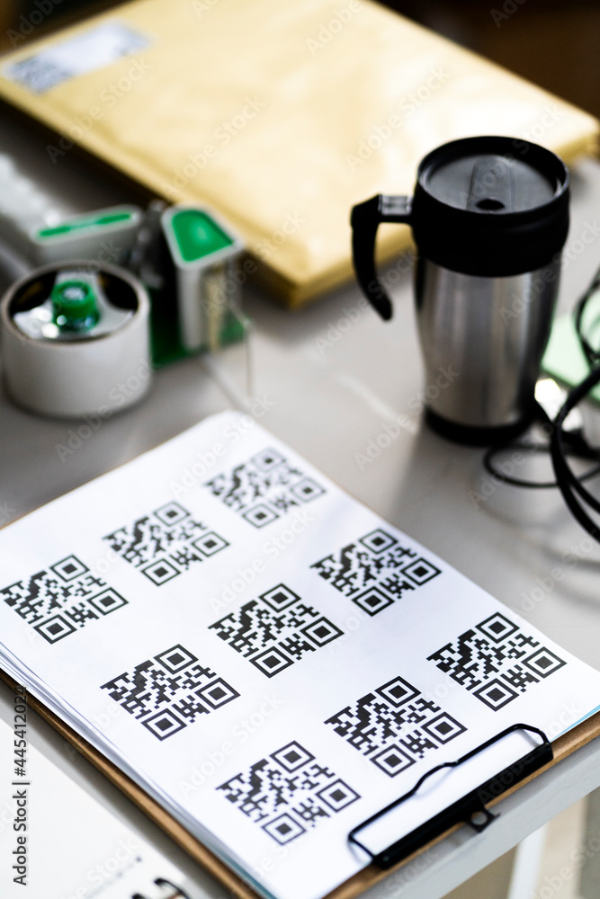 QR codes by coffee pot on desk at office Stock Photo | Adobe Stock