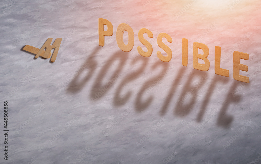 Sunlight and shadow on surface of falling "I" and "M" wood alphabets ...