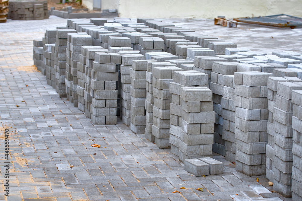 Paving slabs on walkway, repair pavement and laying of paving slabs on ...