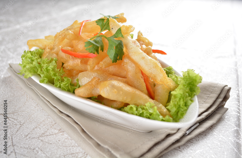 Deep fried crispy mini silver fish seafood snack with vegetables in ...