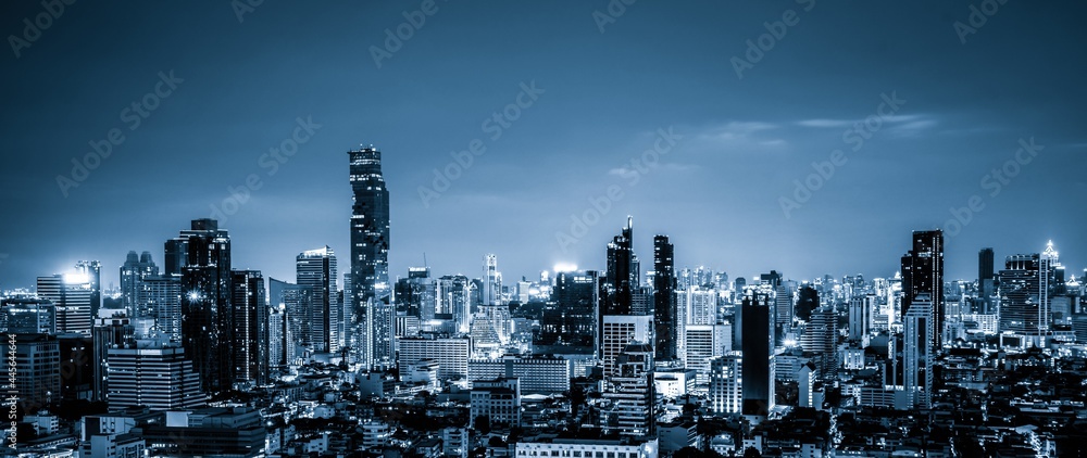 Blue-filtered cityscape and high-rise buildings in metropolis city ...
