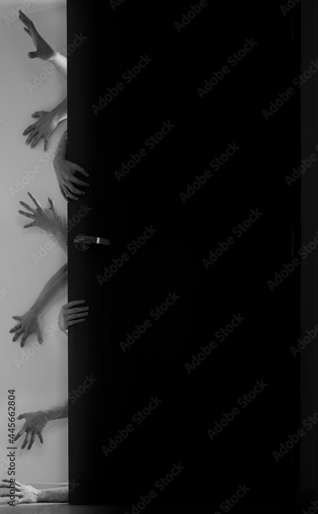 Many hands reaching around a Singapore HDB provided door Stock Photo ...