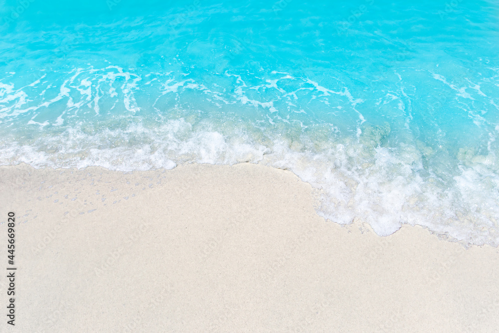 Sea wave and bubble on a sandy white beach blue sea background texture ...