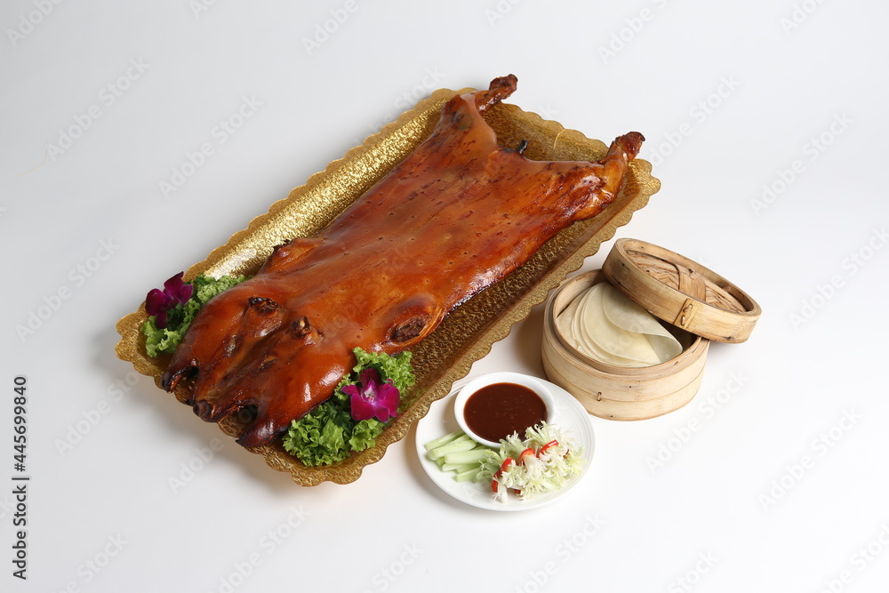 bbq roasted golden color whole suckling pig in crispy skin on gold ...