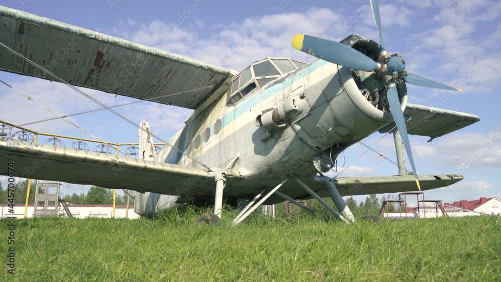 Close-up of cockpit fuselage of old USSR airplane standing in thick ...
